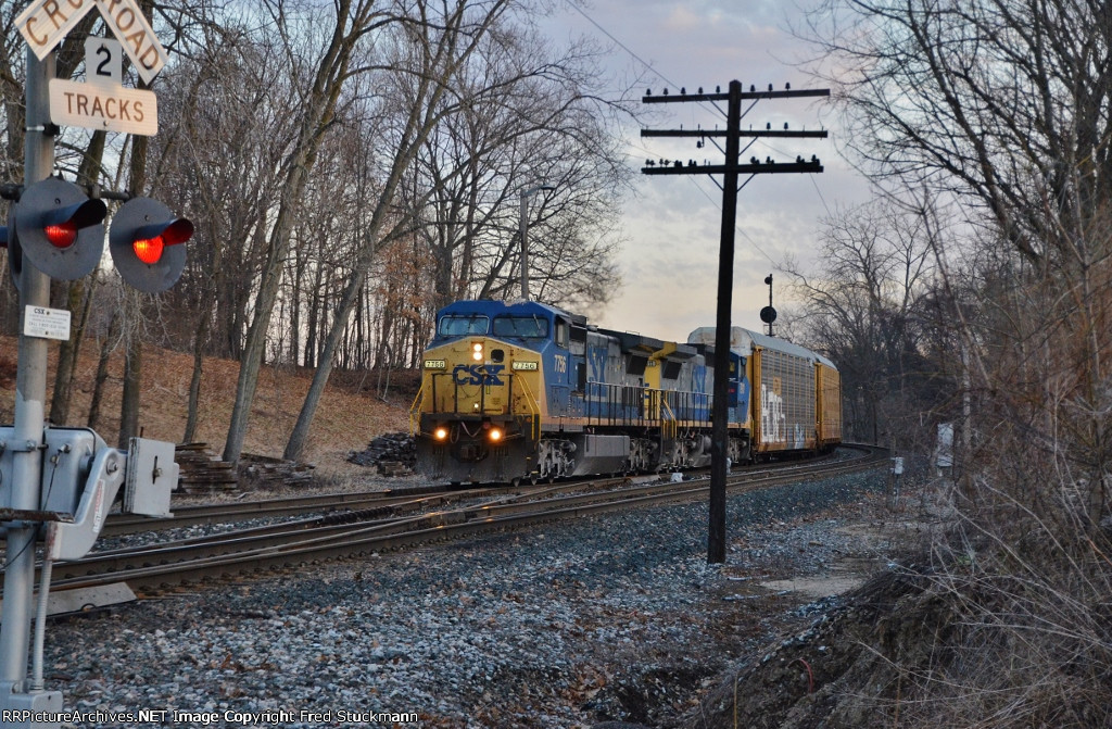 CSX 7756 runs west.